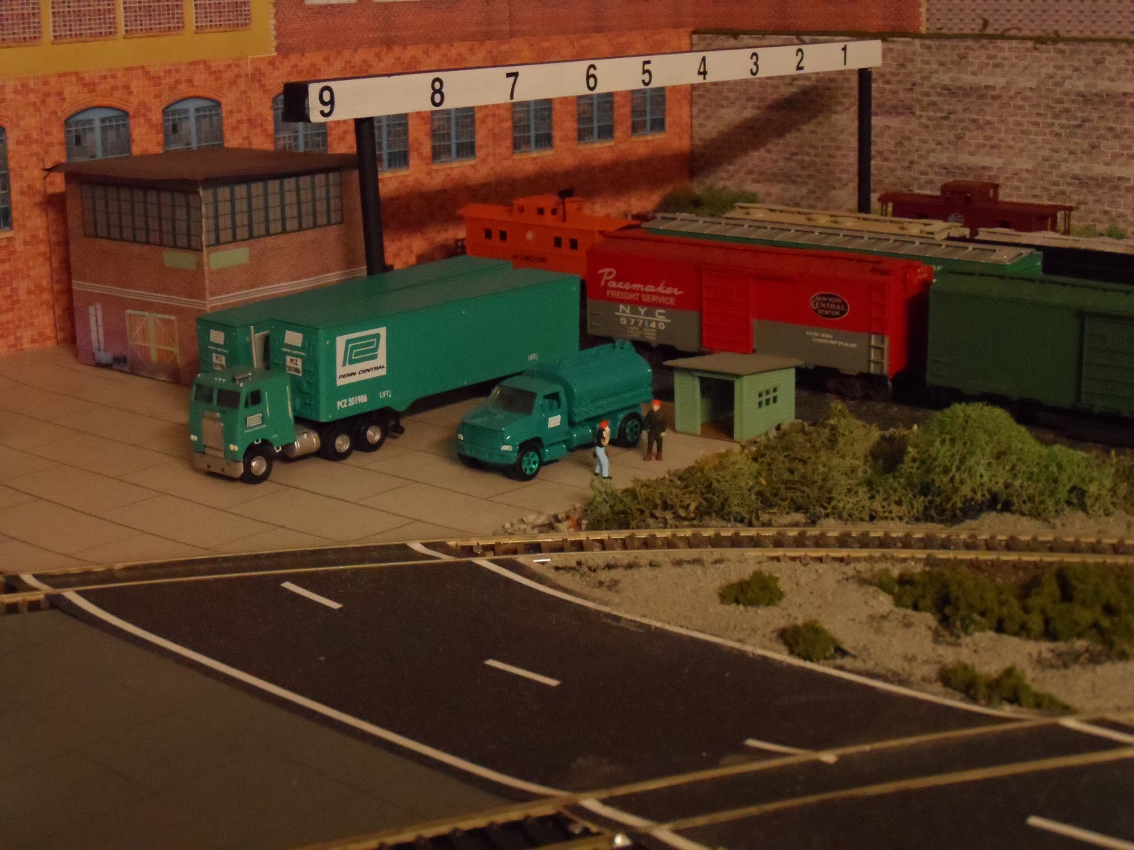 New York Central Train Layout: Matchbox Fuel Trucks and Upgraded Cabooses.