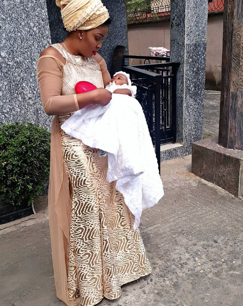 Prince Iyke Olisa and wife dedicate their daughter in church