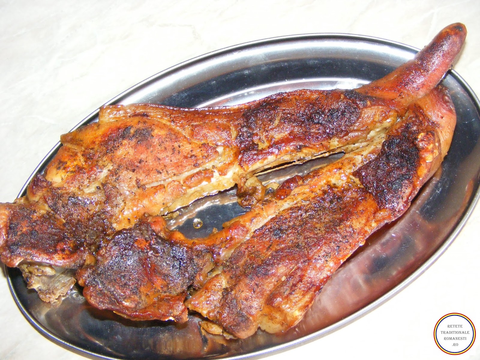 Cozi de porc la cuptor reteta | Retetetraditionaleromanesti.ro