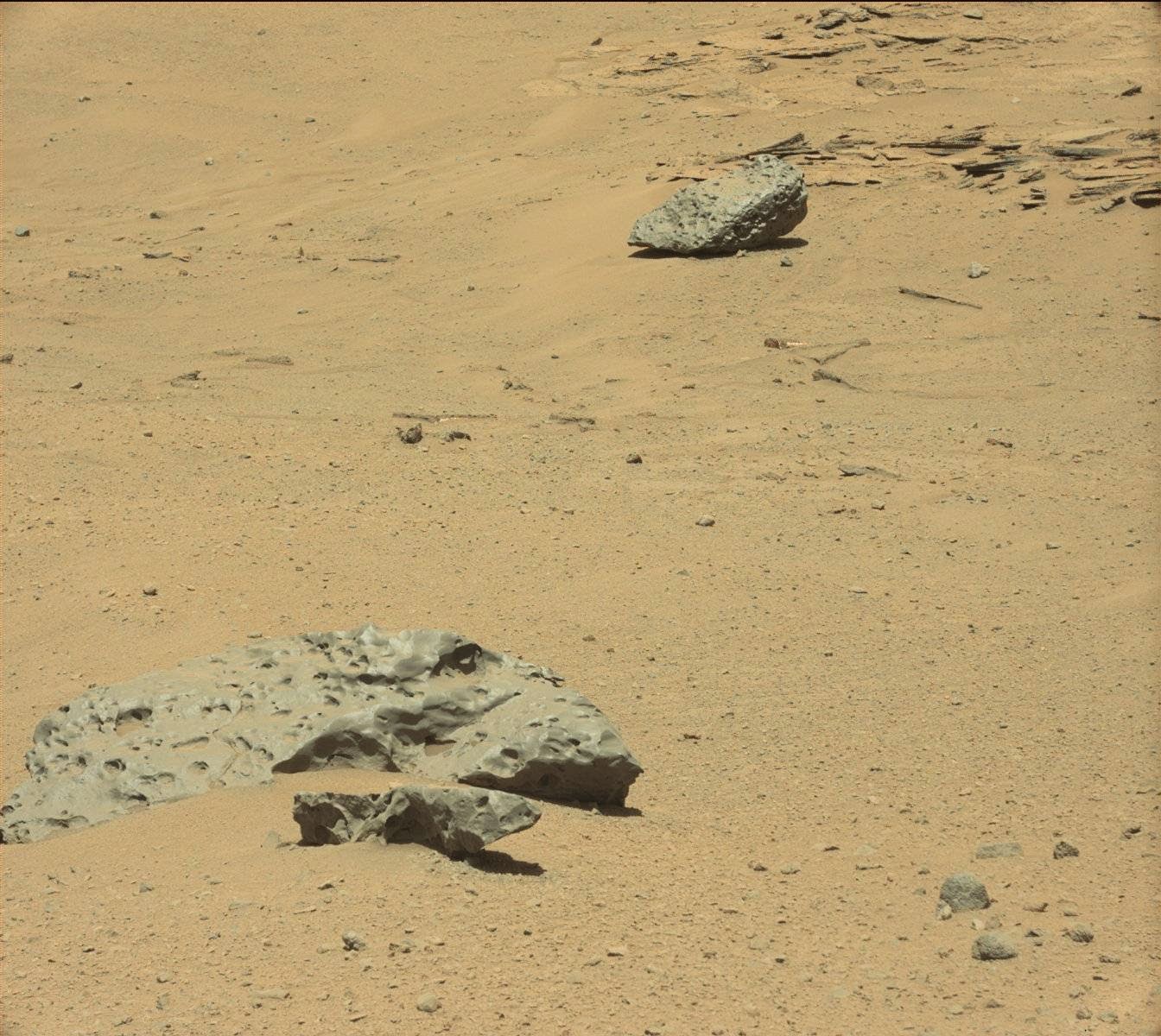 inordinate detail: Shiny, scalloped iron meteorite on Mars
