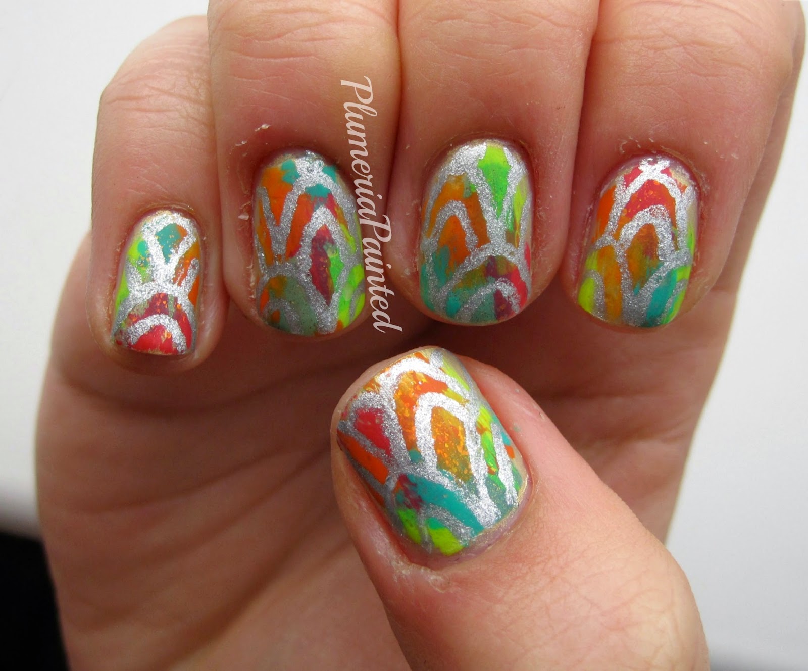 PlumeriaPainted: Distressed art deco arch nails
