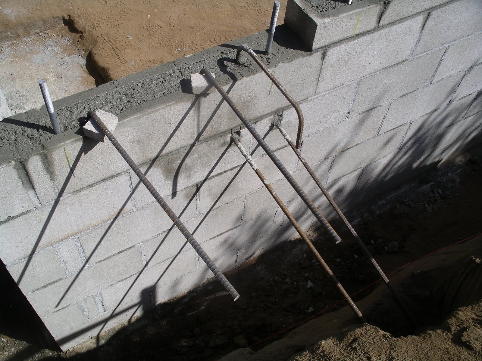 Home Remodeling Step By Step: Step 12 - Grouting the Retaining Wall