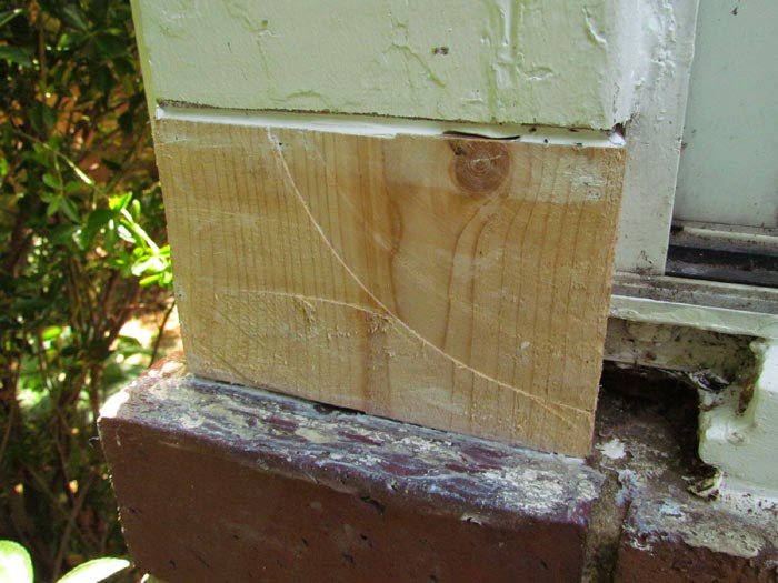 Rotted Exterior Wood Post Repair Completion Crawls Backward (When Alarmed)