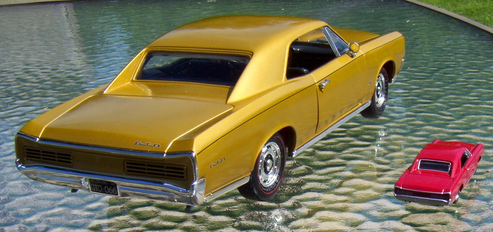 GTO vs. GTO: AutoWorld 1:64 vs. Ertl 1:18 1966 Pontiac GTO