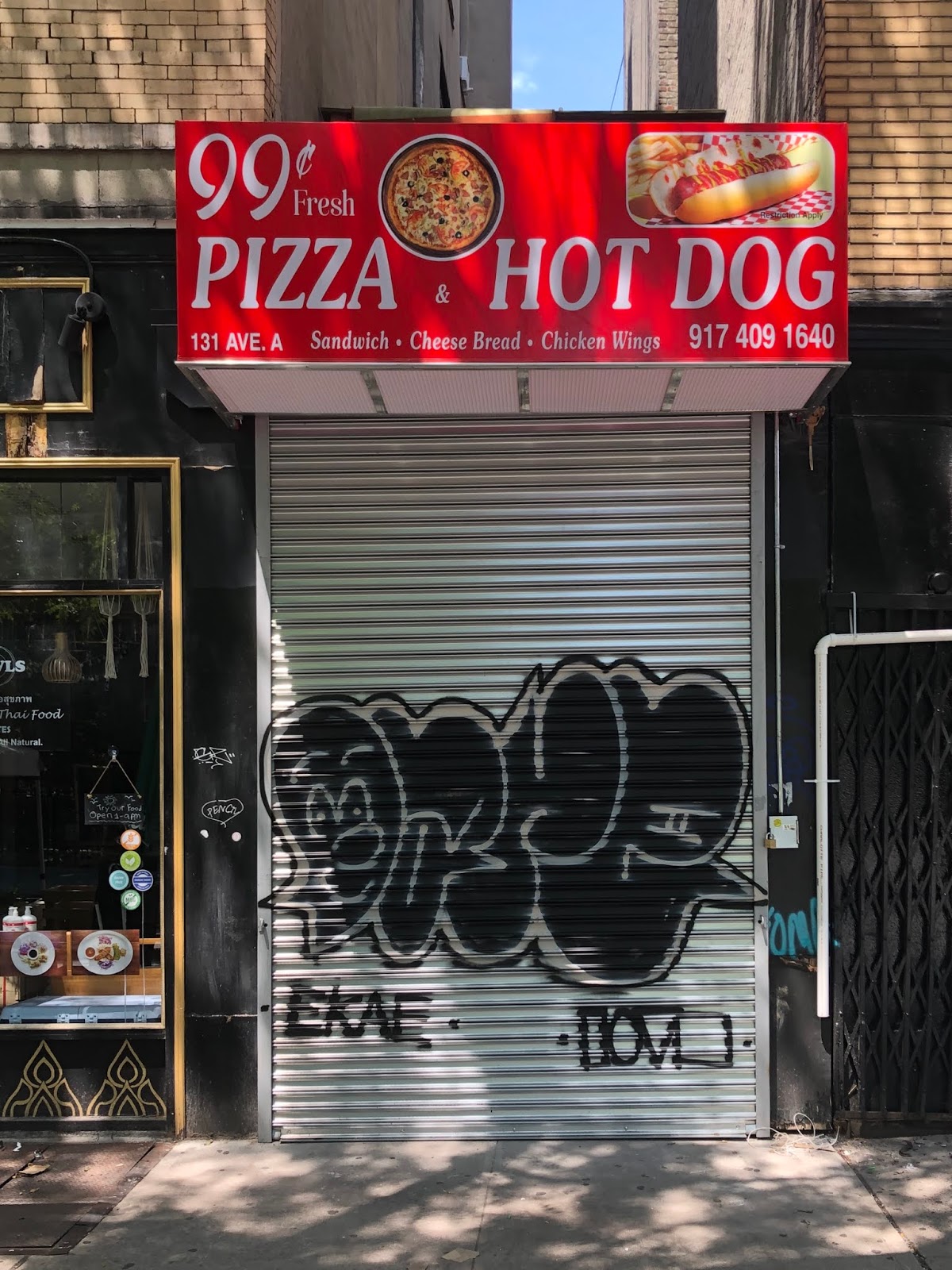 EV Grieve: Here's the 99-Cent Pizza & Hot Dog signage on Avenue A