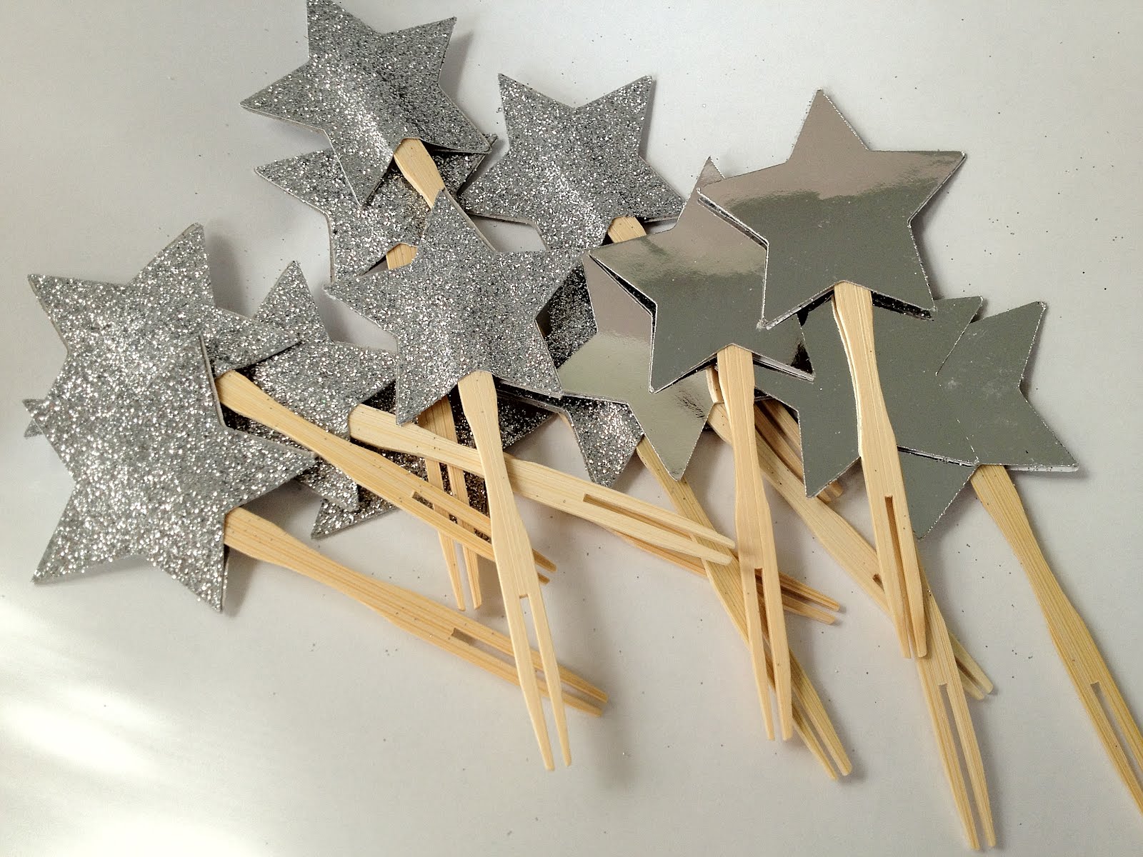 Cake Face Toppers: Glitter silver star toppers