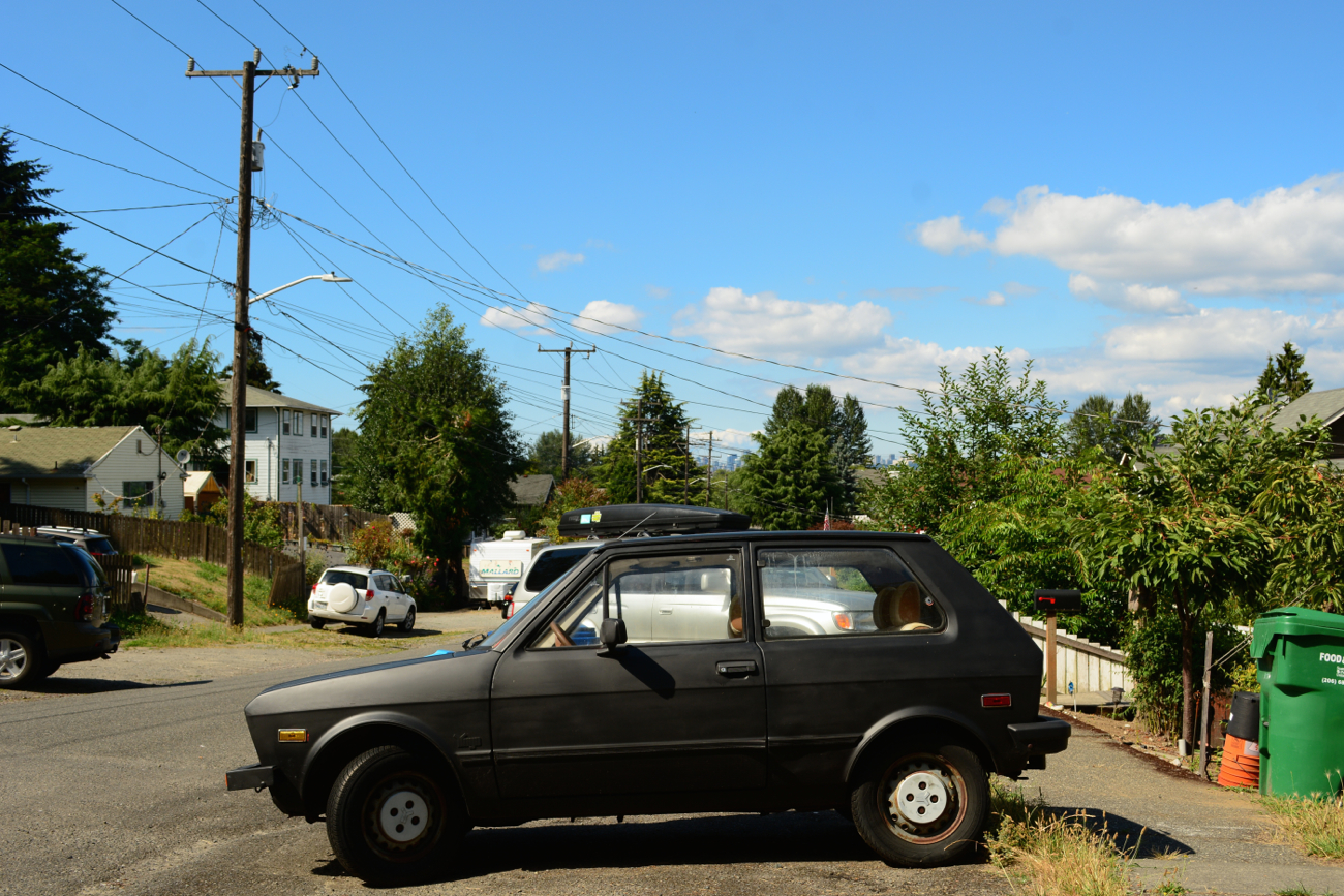 OLD PARKED CARS.: 1987 Yugo GV.