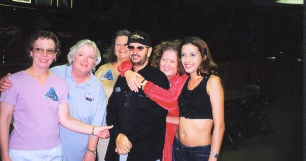 Meet the Beatles for Real: A hug from behind