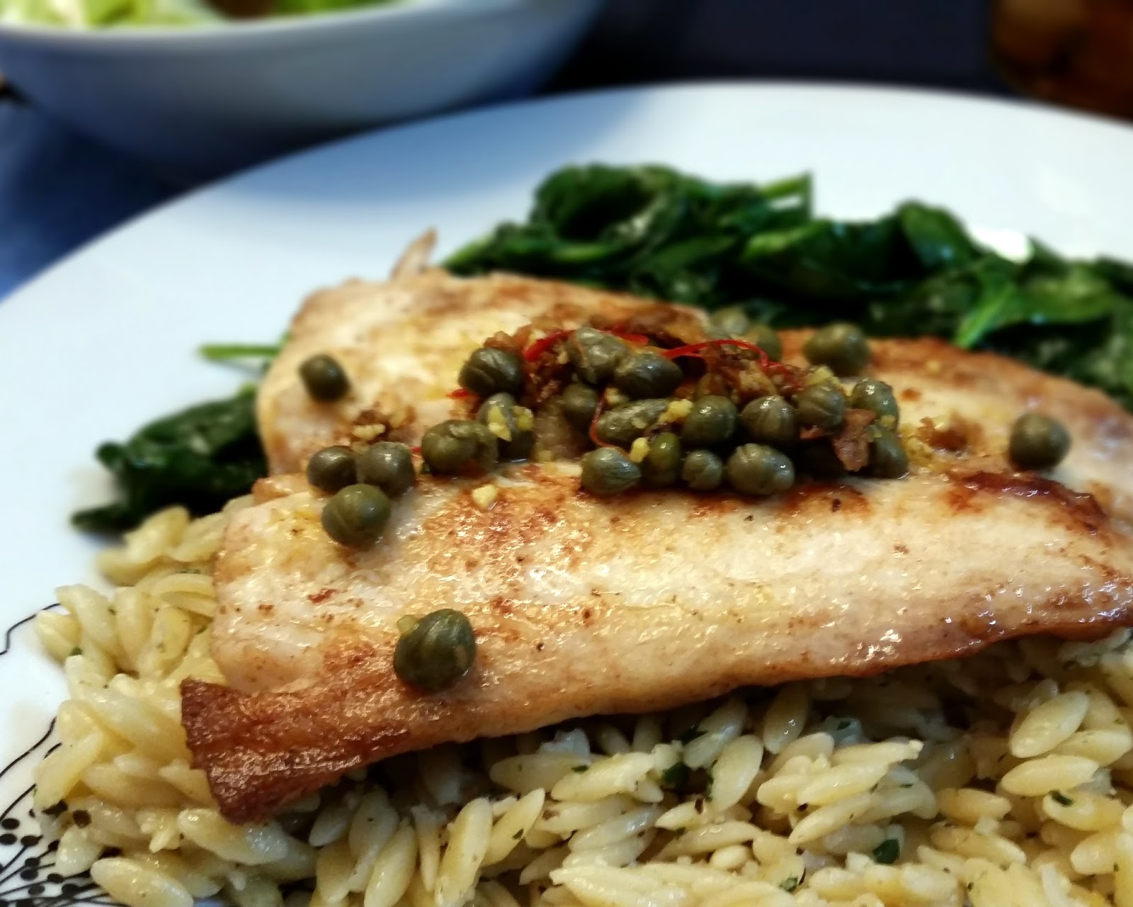 A Bite to Eat: Pan-Seared Cobia with a Caper and Saffron Reduction