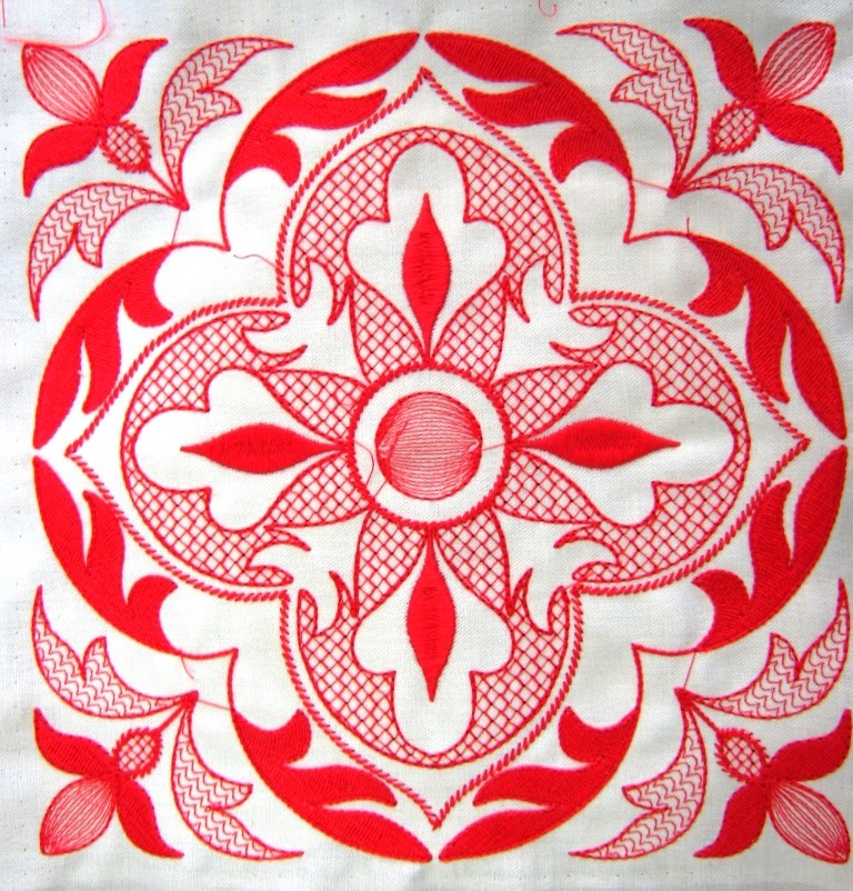A Quilter doing Machine Embroidery: Redwork or Coral Red?