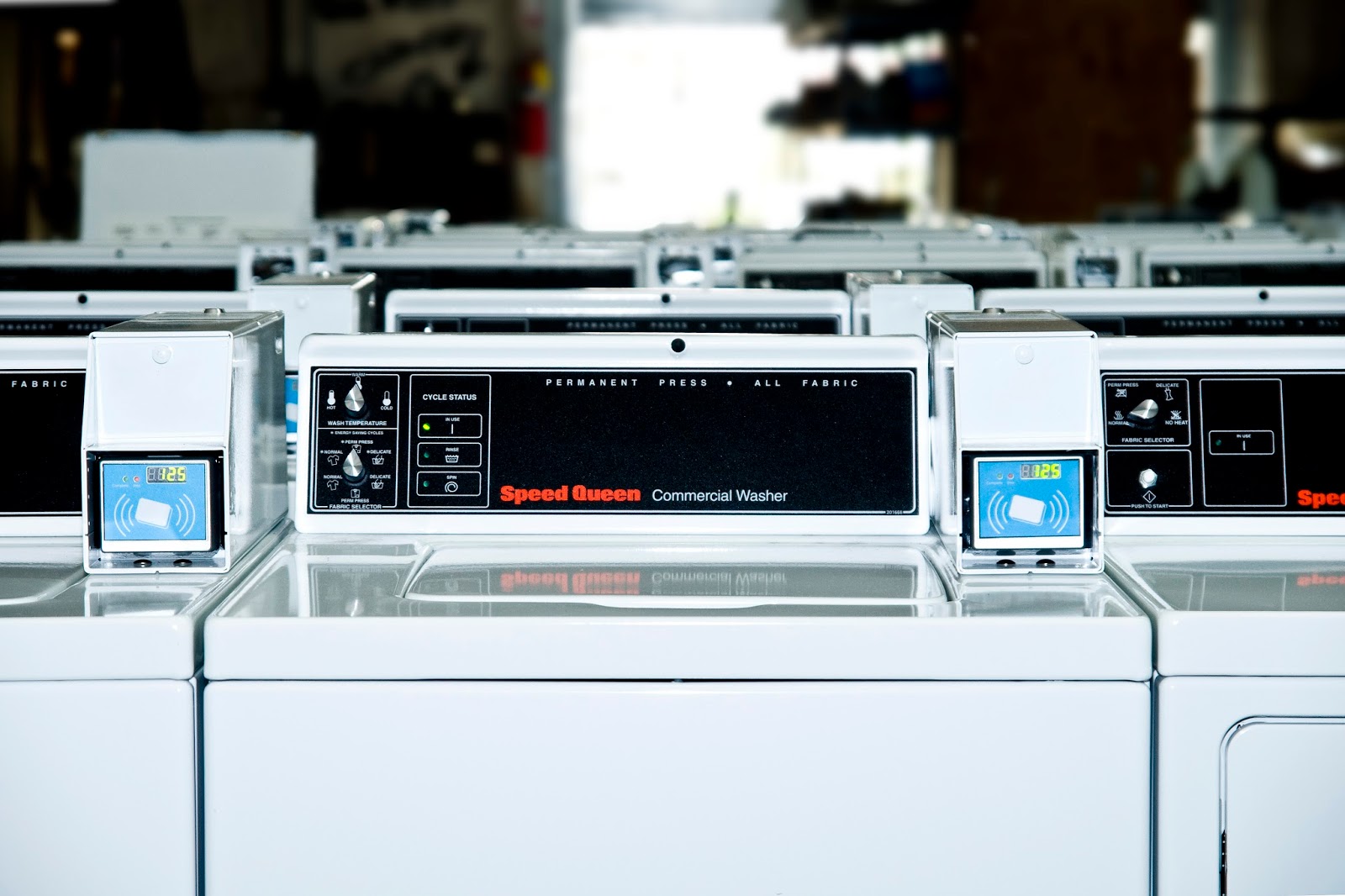 Commercial Laundries: Card Operated Washers and Dryers