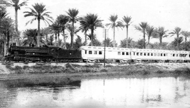 transpress nz: Egyptian passenger train by the banks of the Nile, circa ...