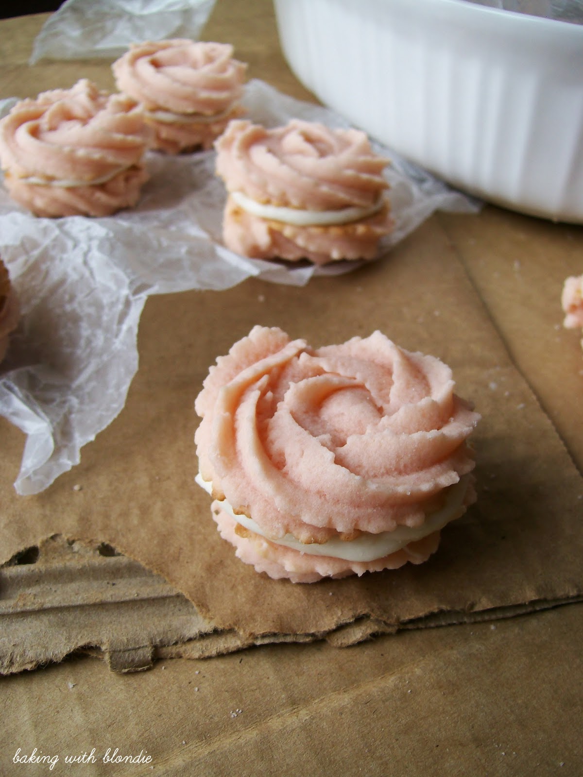 Raspberry Rosette Spritzer Cookies with Almond Cream Cheese Filling