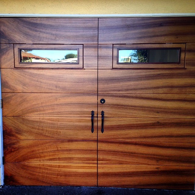 wood: Parota custom garage doors by Phil Audia of woodandsilver.com