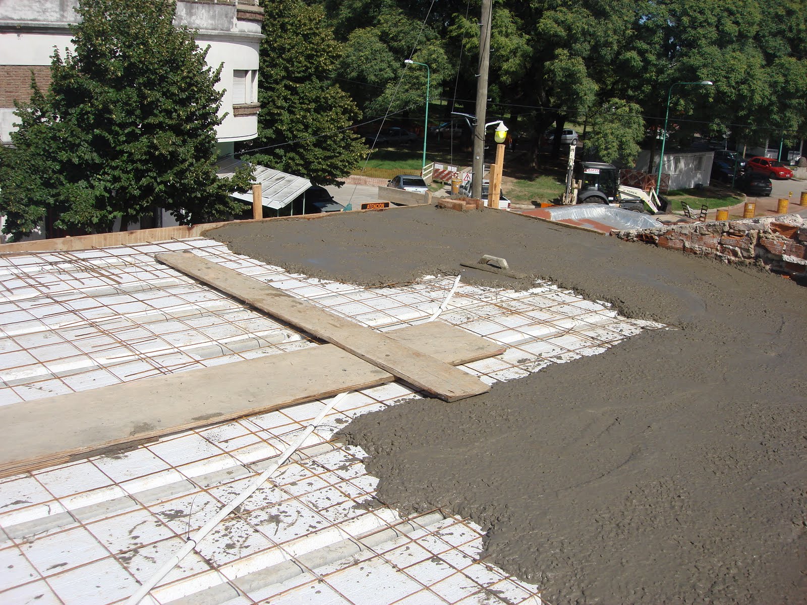 Refacción en Devoto: Llenado capa de compresión.