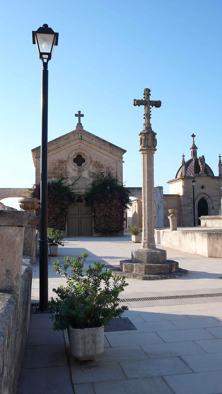 Creus de terme: Petra, pel Juan Reus.