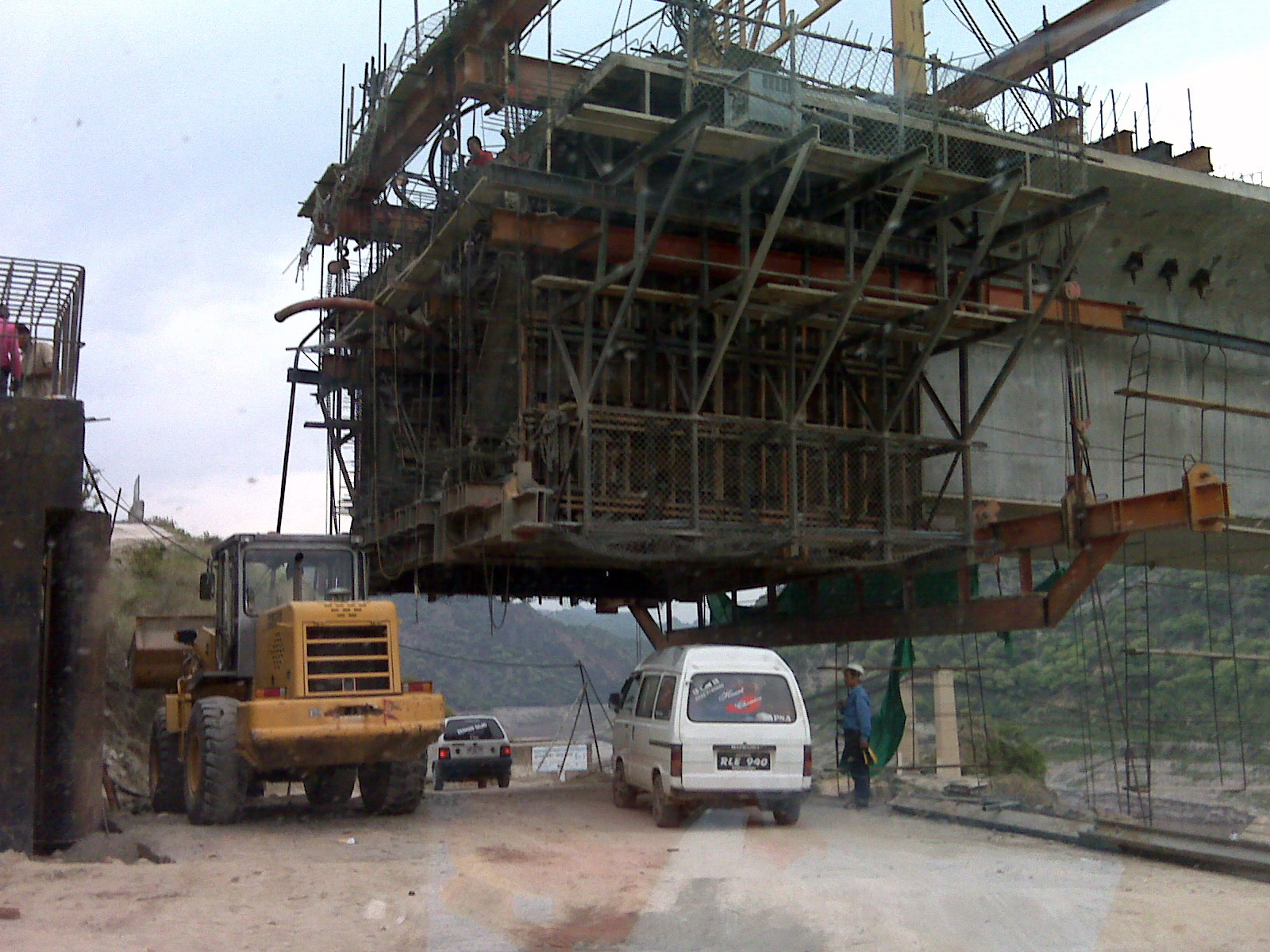 A vehicle is passing by Dangali Bridge | Dadyal