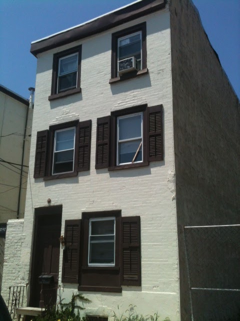 designer in exile: The Tiny House of the Father, Son, and Holy Ghost