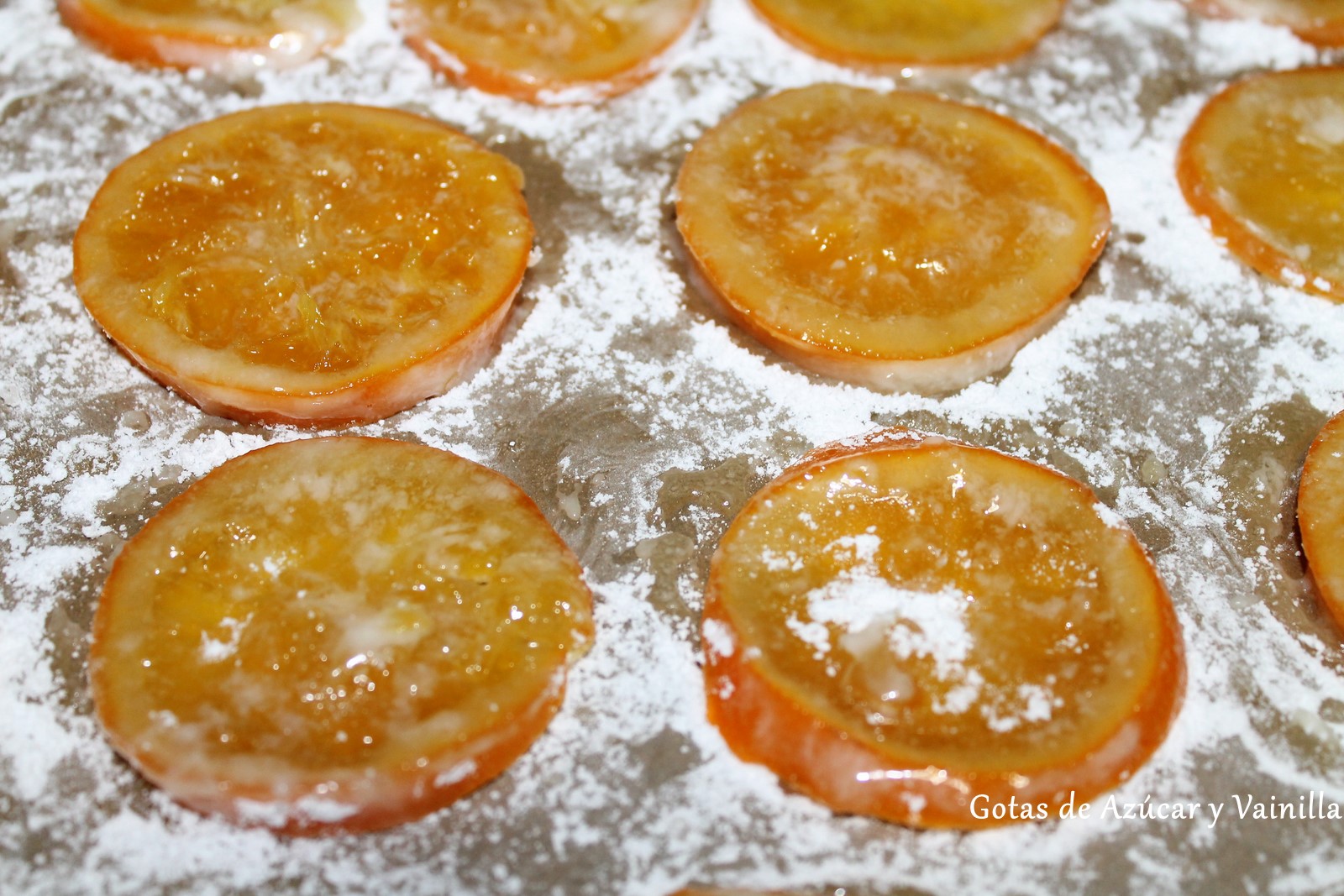 Gotas de Azúcar y Vainilla: Naranjas confitadas.