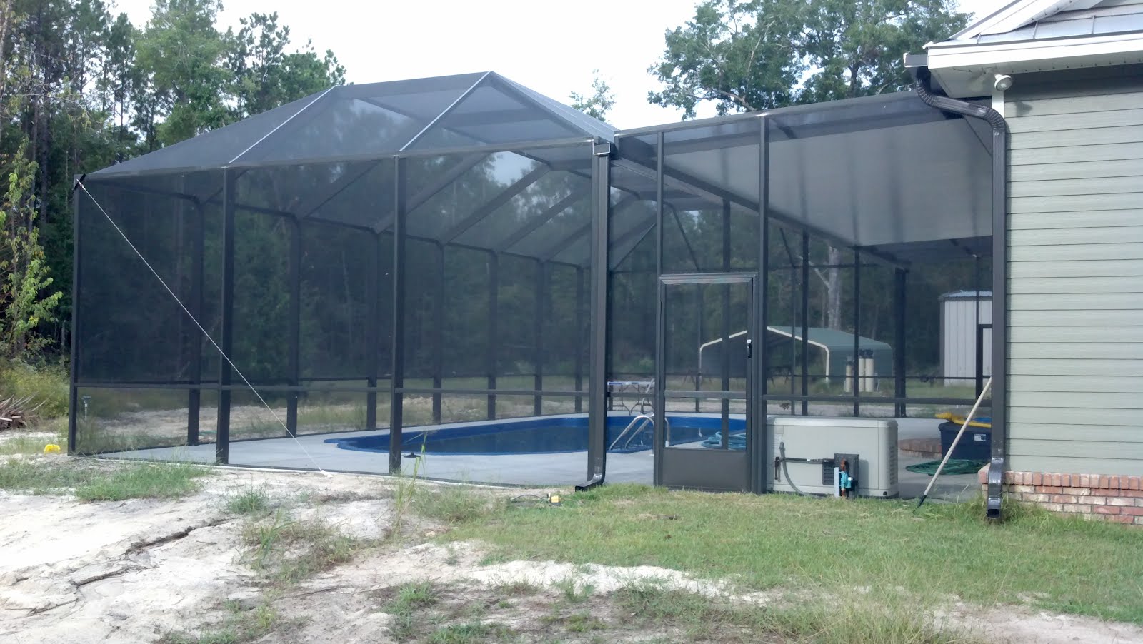 Screen Rooms Tallahassee: Pool Enclosure with solid roof area in ...