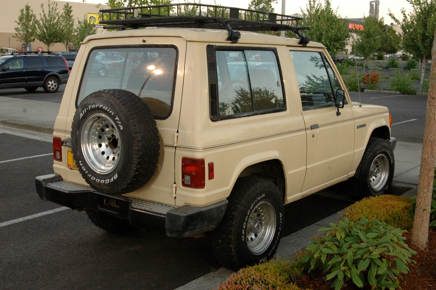 OLD PARKED CARS.: 1983 Mitsubishi Montero.