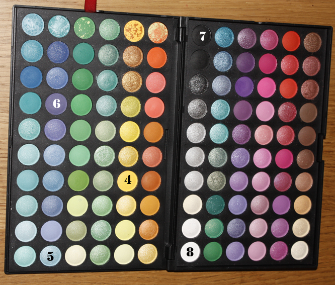 Madam Noire Makeup Studio: Tutorial: Blue and yellow cateye