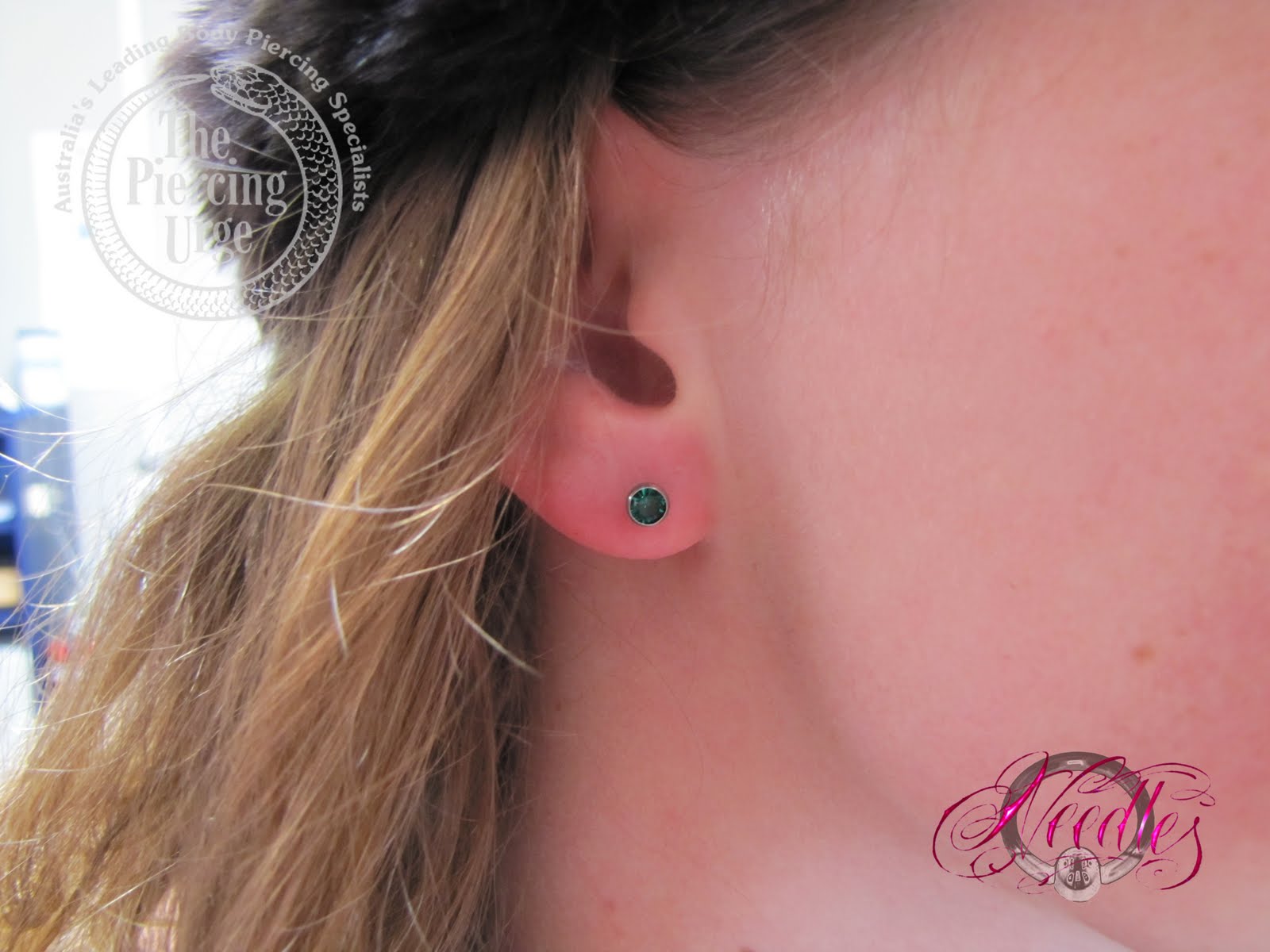 NINE BODY PIERCING BLOG: Fresh 14g Ear lobe with Emerald Gem Set