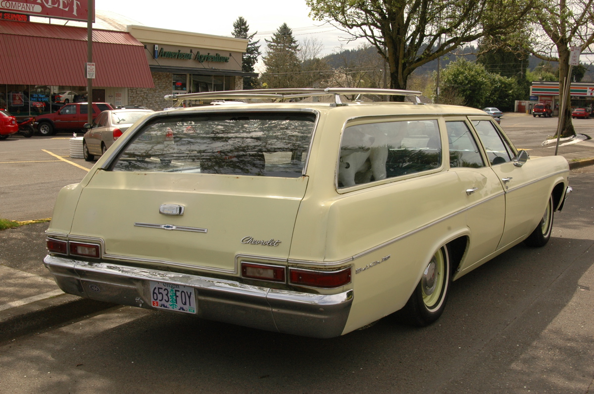 OLD PARKED CARS.: 1966 Chevrolet Bel Air Wagon.