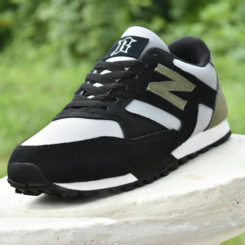 New Balance Classic GO Hitam Hijau Putih | Omsepatu.com
