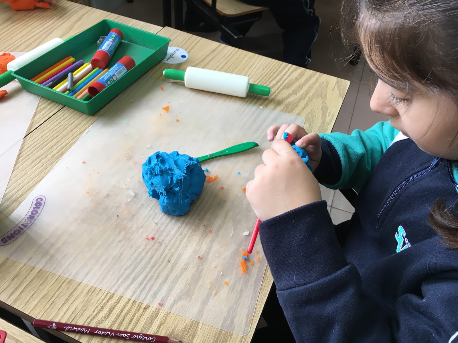 Learning and growing together.: Creating plasticine sculptures!