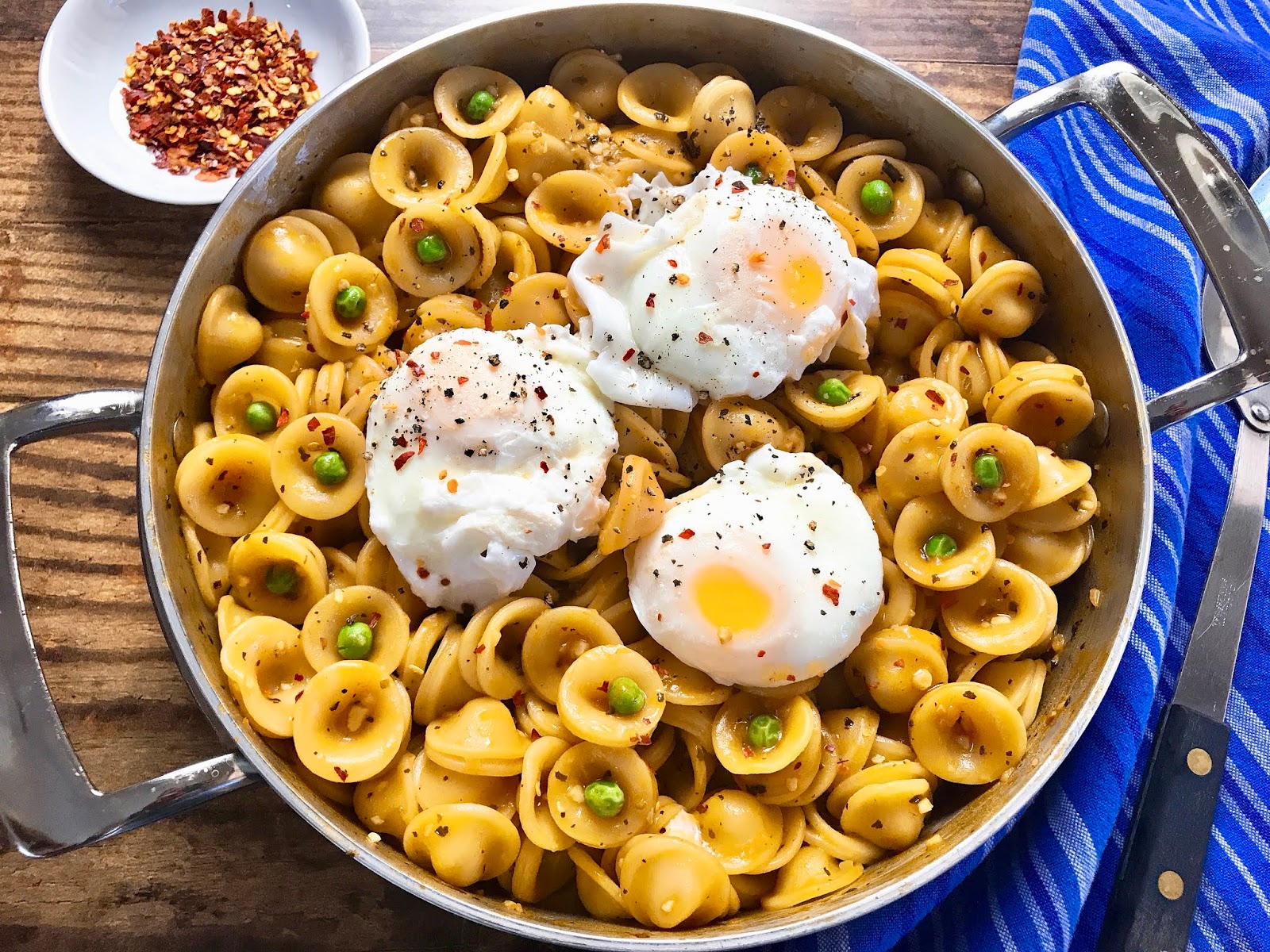 Orecchiette with Pea Pearls, Parmesan Rind and Poached Egg