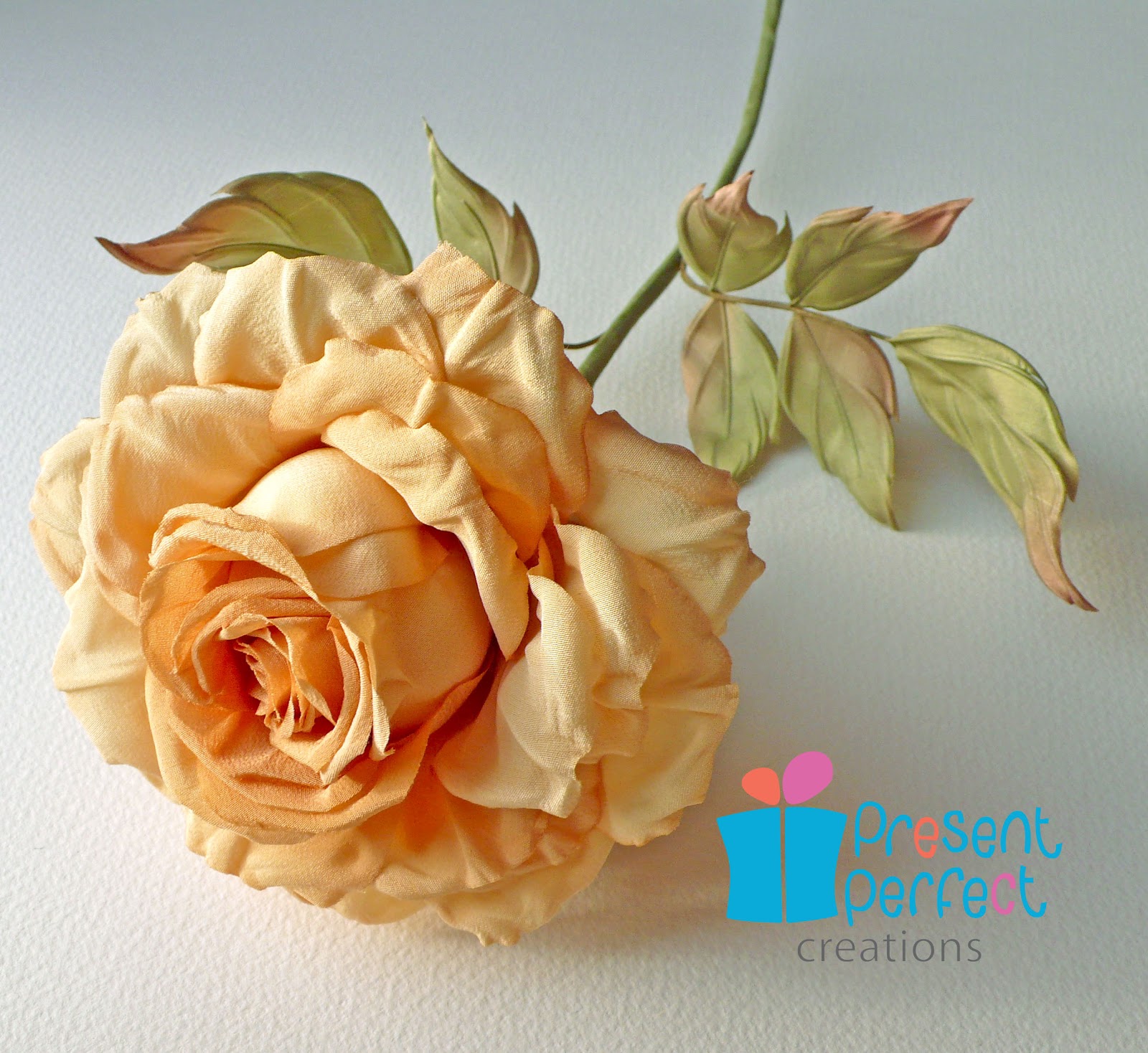Present Perfect Creations: A large tea-coloured rose