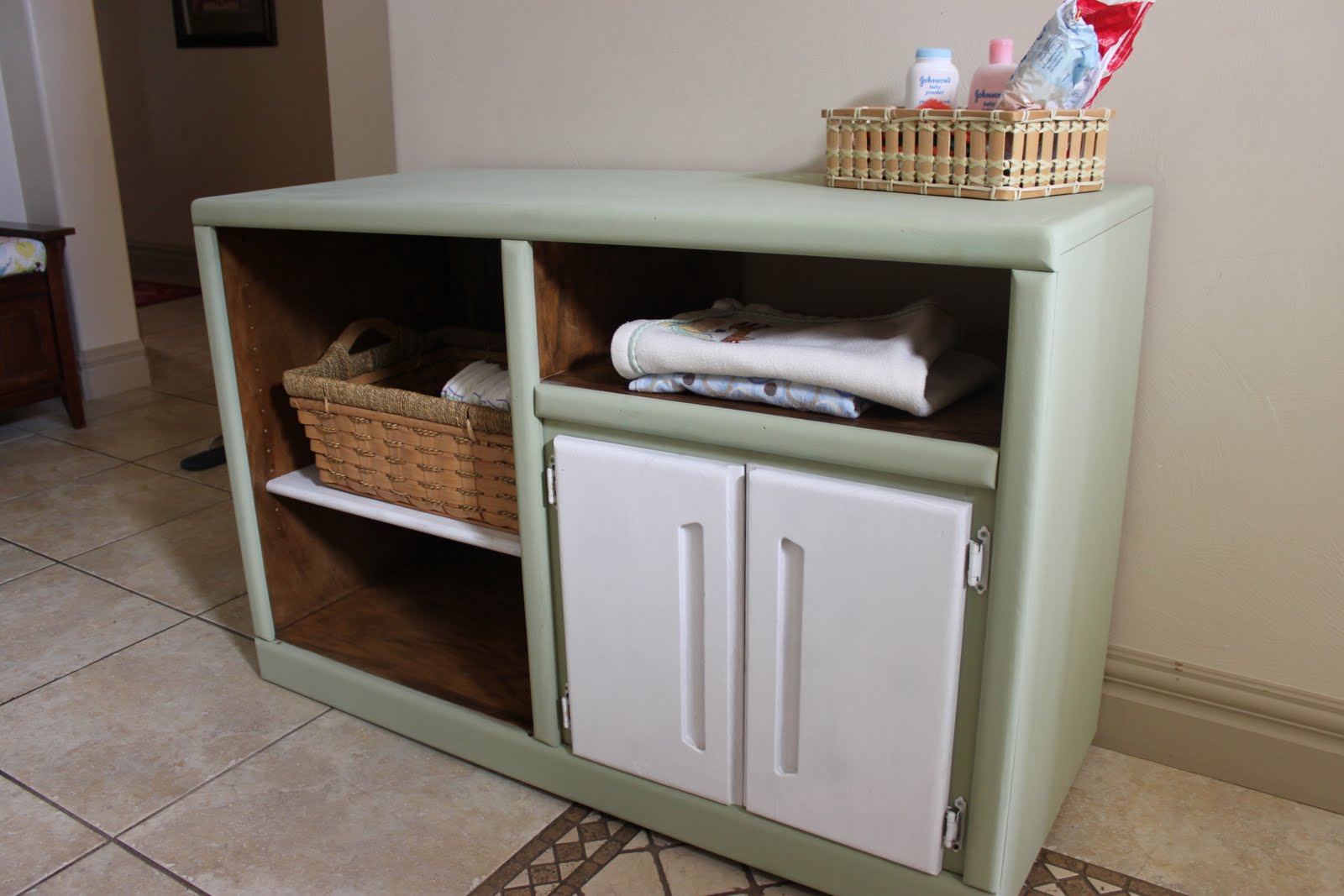 Furniture remix, same stuff new twist!!!: T.V. Console turned Baby Station