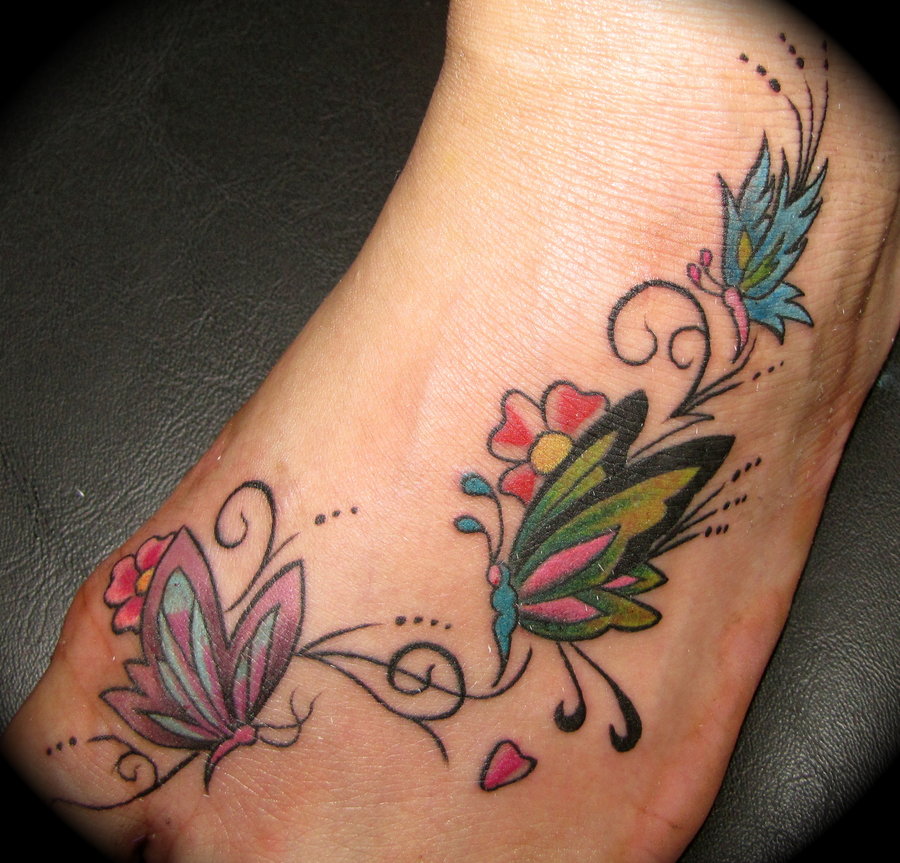 Colorful Butterfly Tattoo on Feet - Tattoos Ville