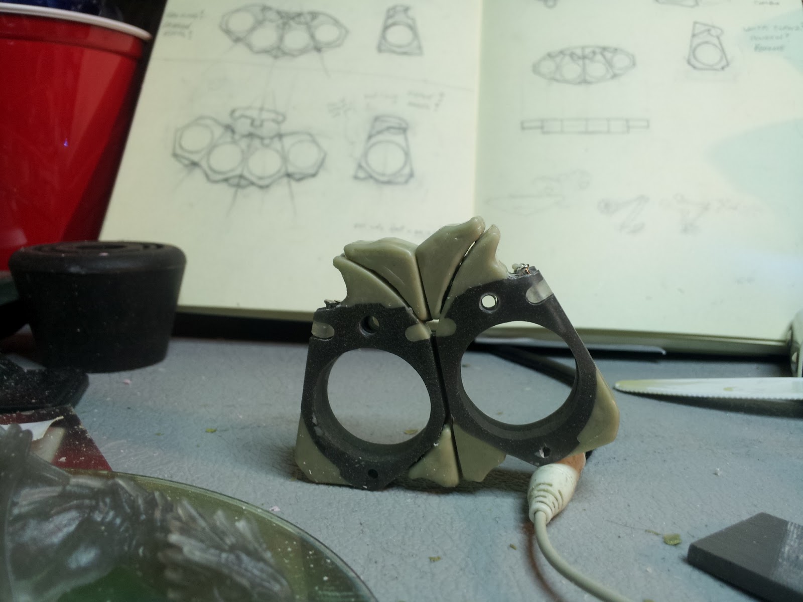 Kilroy's Attic: Path of Orion; Folding Brass Knuckle Ring