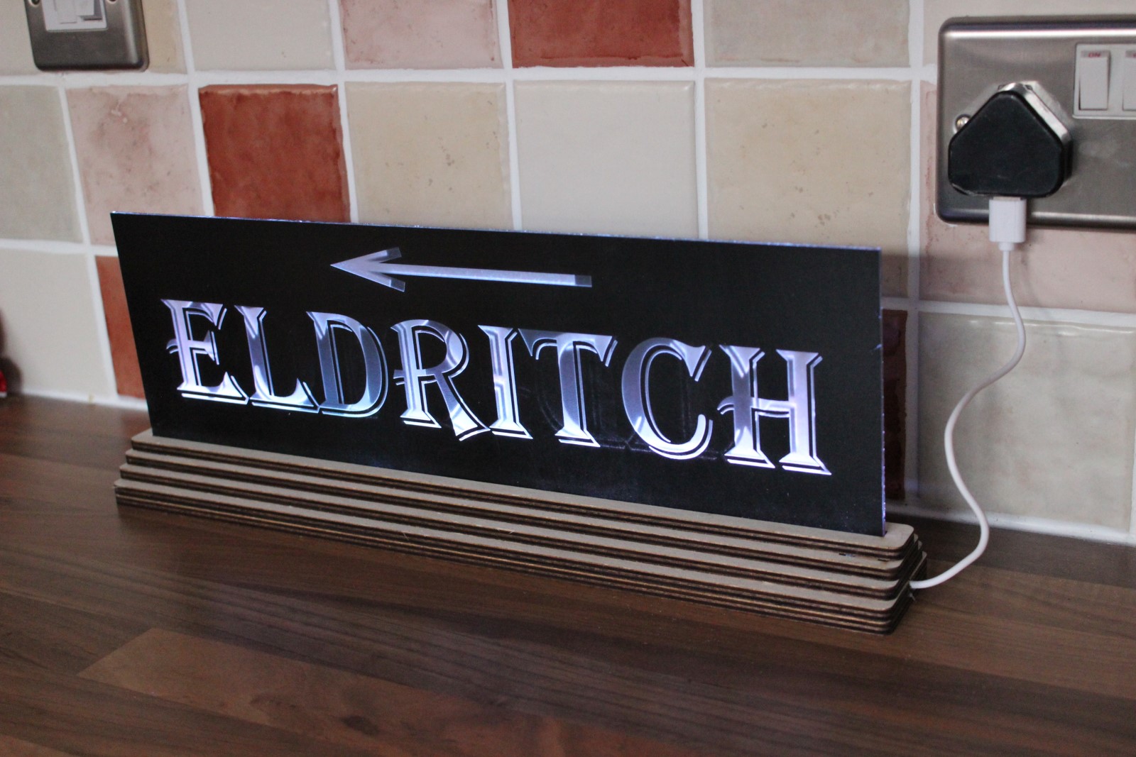 Double sided edge lit sign