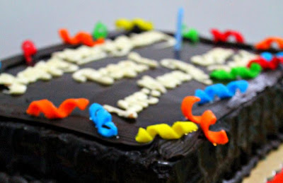 Charming Cake: Red Ribbon Chocolate Dedication Cake