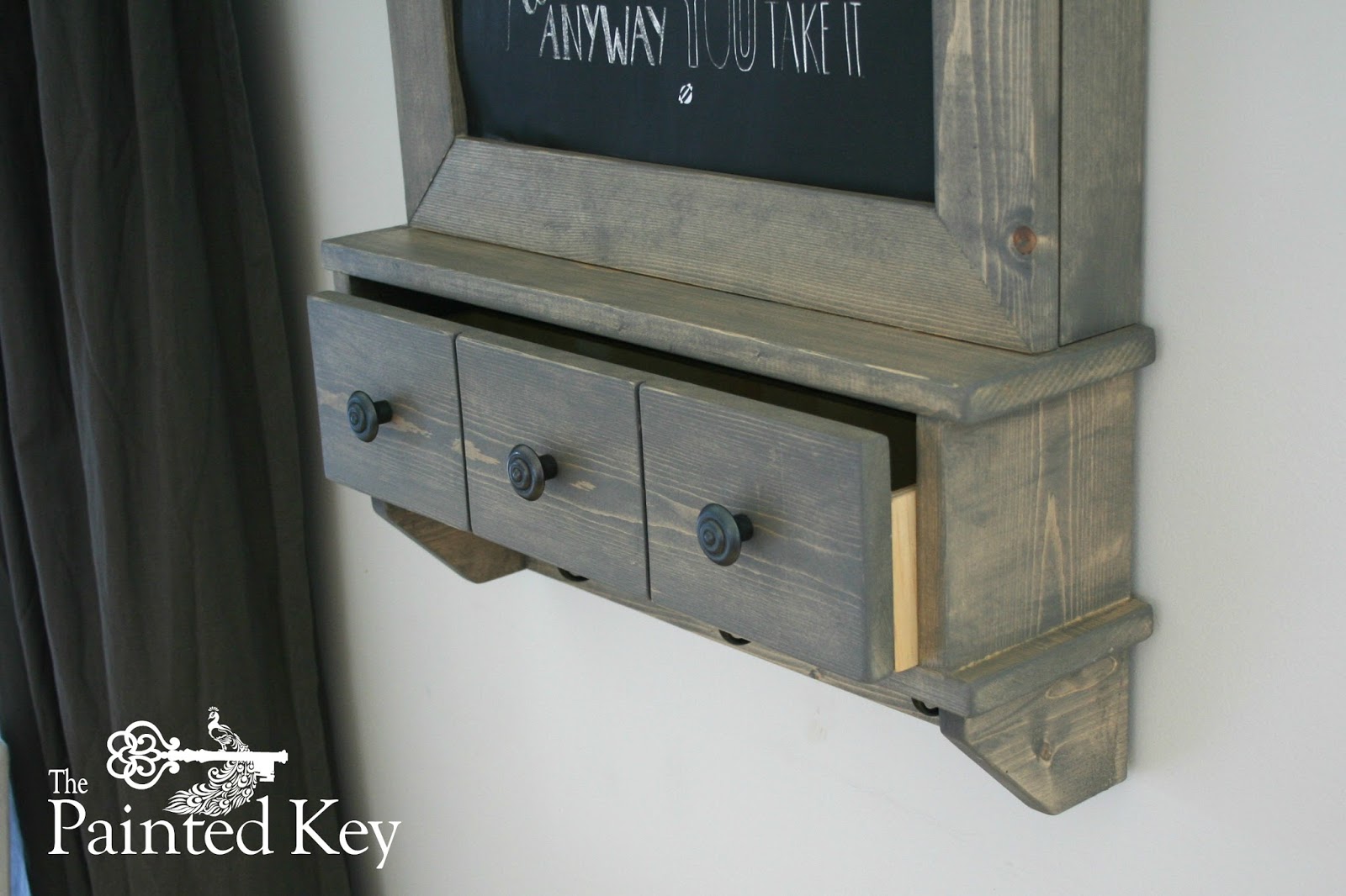 The Painted Key: Hidden Storage Cabinet