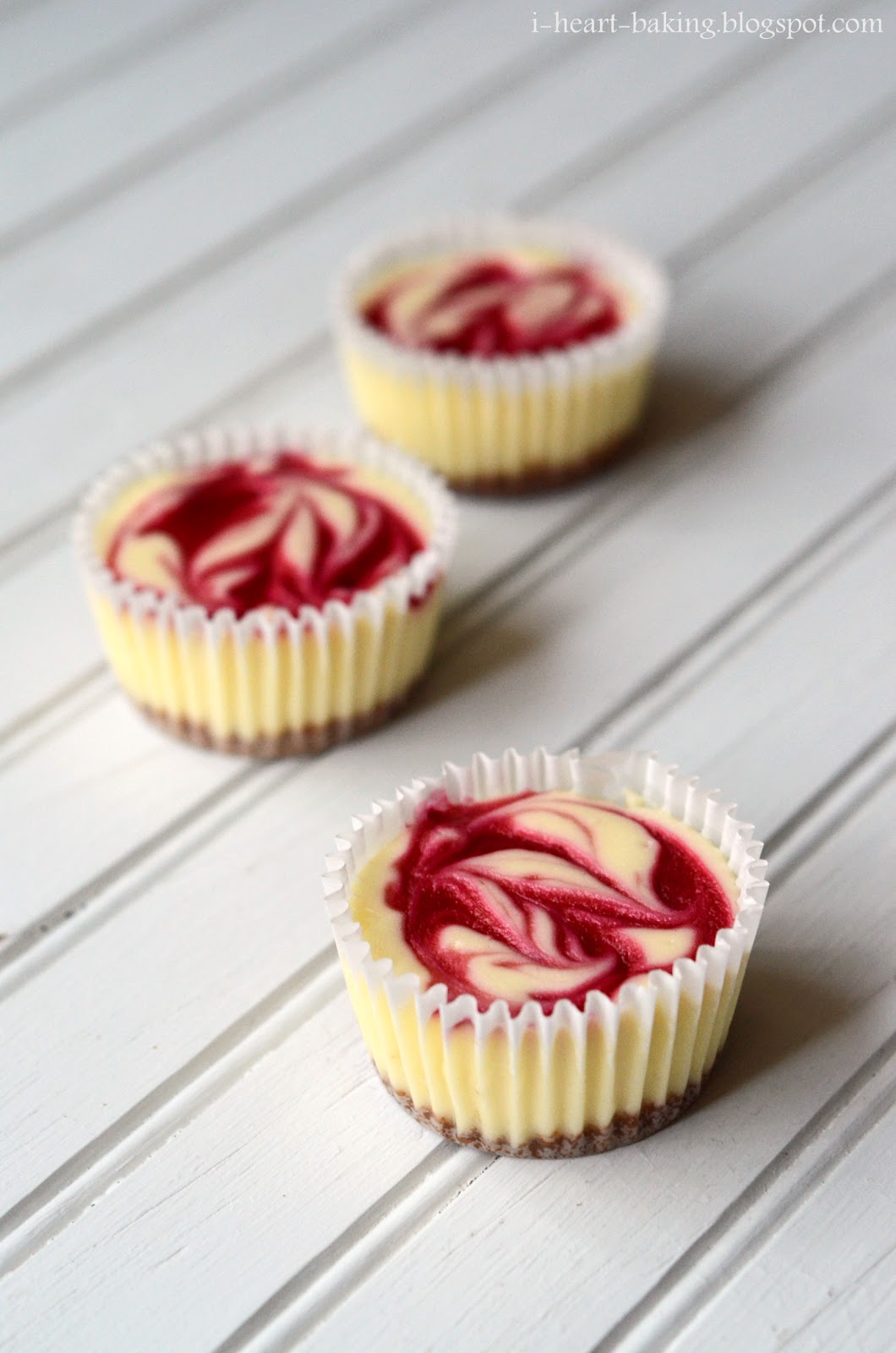 i heart baking!: raspberry marbled mini cheesecakes