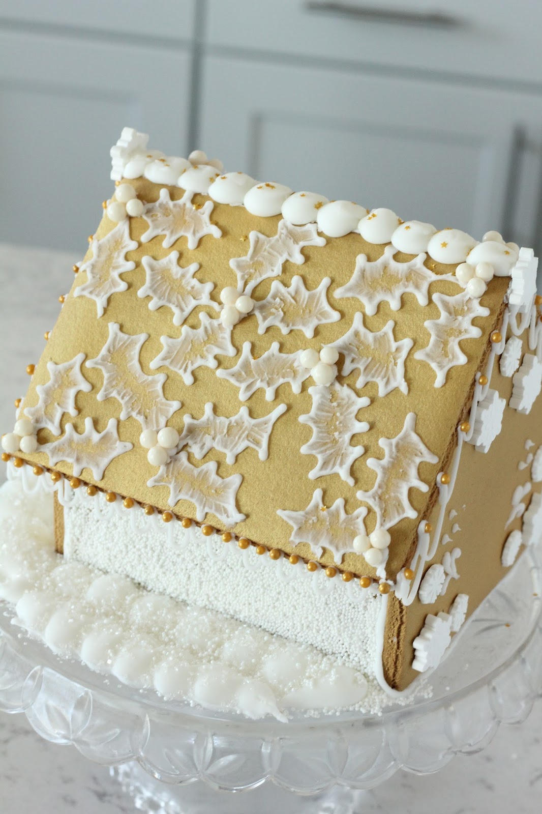 White and Gold Gingerbread House
