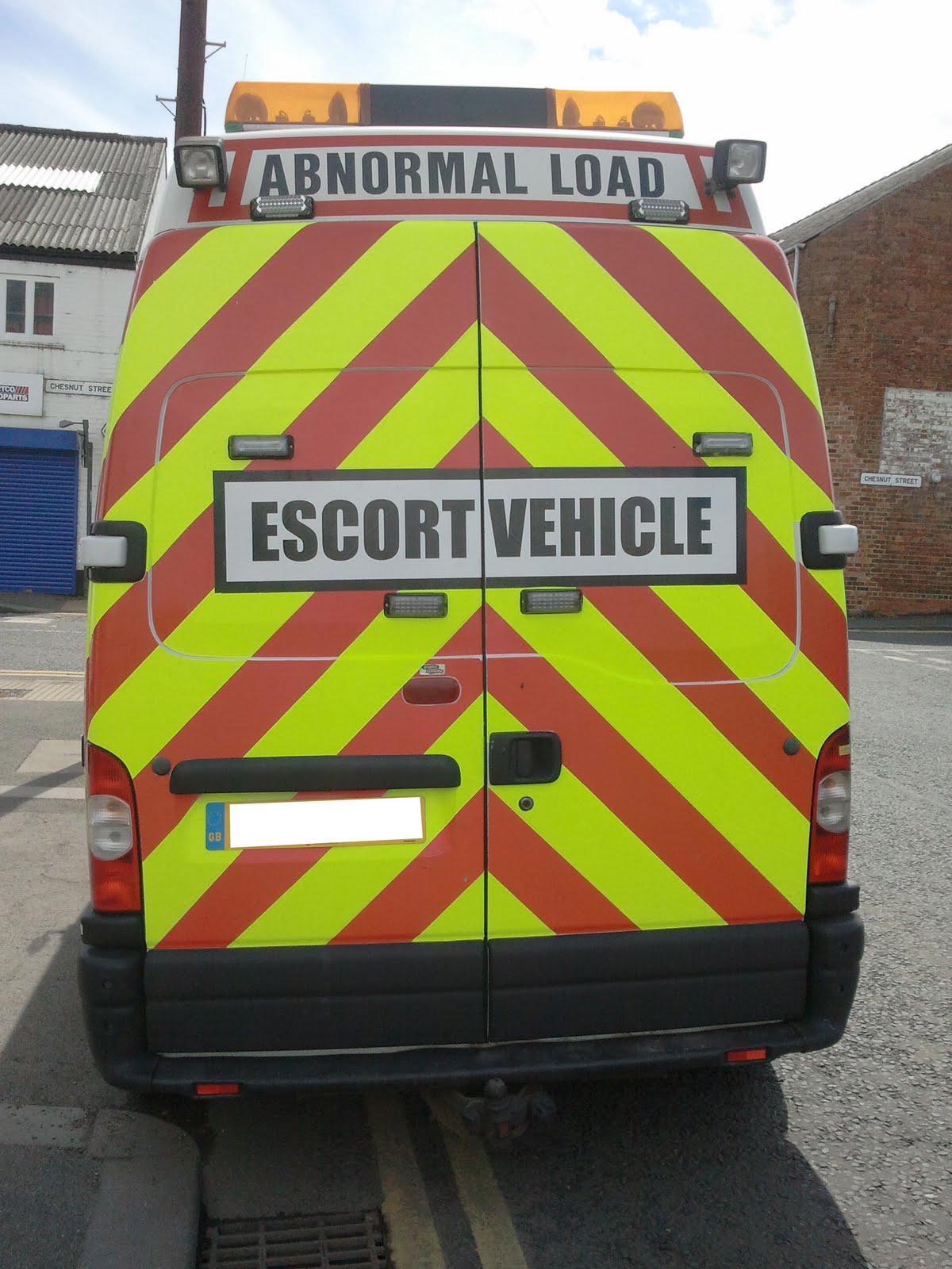 The Green I Signs Blog: wide load escorting vehicle stripes in day glo ...