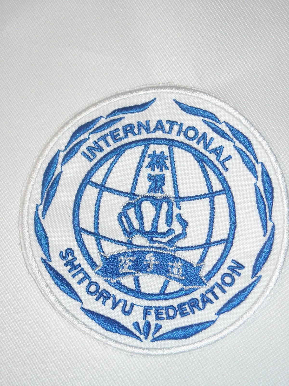 LOGHI RICAMATI SU ABBIGLIAMENTO SPORTIVO E ABITI DA LAVORO