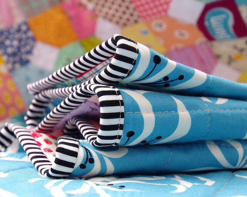 Scrappy Bow Tie Quilt - A Finished Quilt | Red Pepper Quilts | Bloglovin’