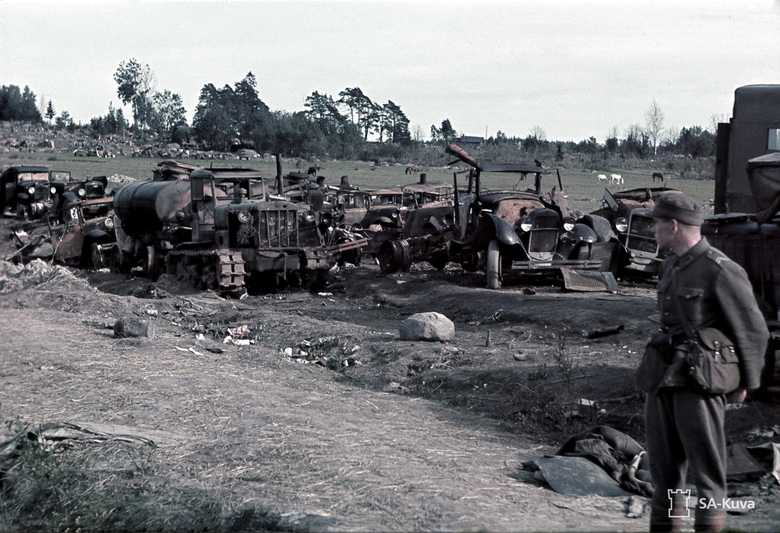 World War II in Color: Finnish NCO Inspects the Russian Vehicles ...