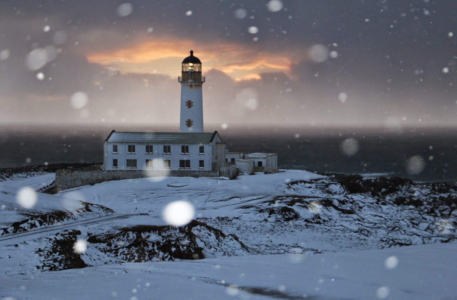 Fair Isle: February's Photos - Snow, Lighthouse, and Malcolm's Head.