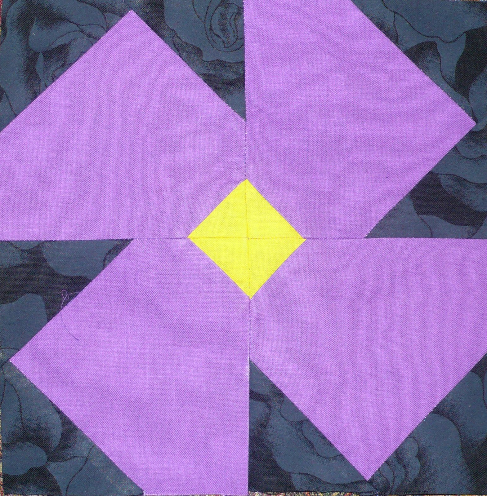 Block Lotto: How would you quilt these violets? (one block for Kim H.)