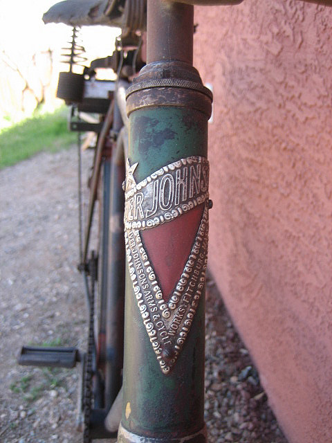 Fast is fast...: Antique bicycle badges.
