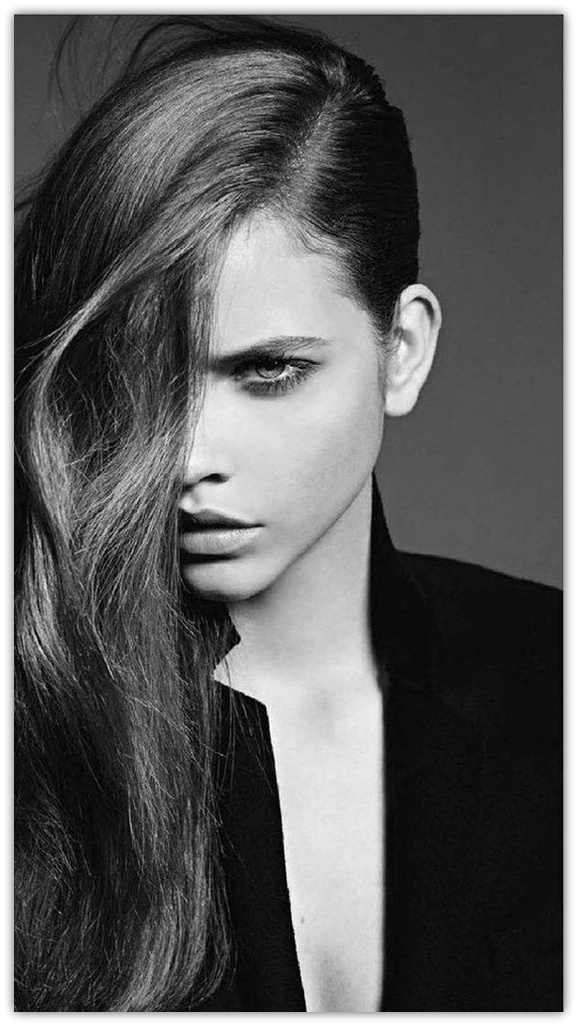 Deep side parted hair