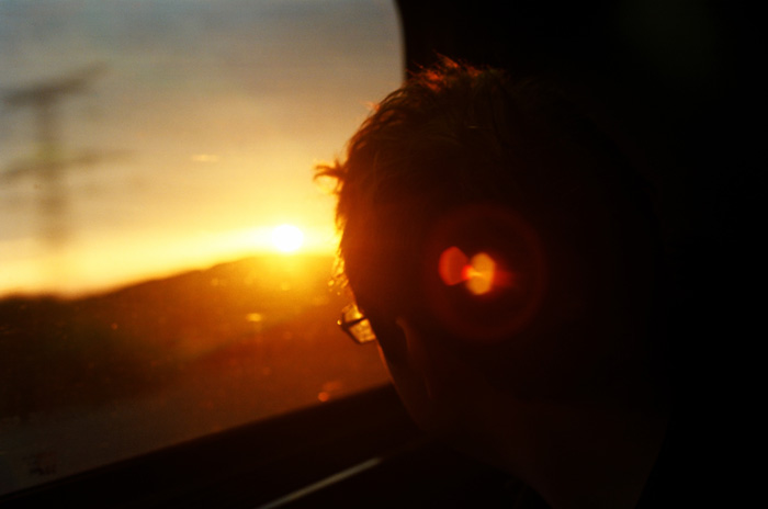 On My Way: Sunset through a train window