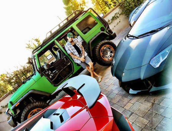 Photo: Chris Brown shows off his custom cars